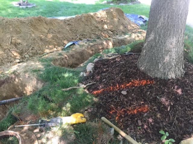 Water line replacement, by boring under a sidewalk, a driveway,